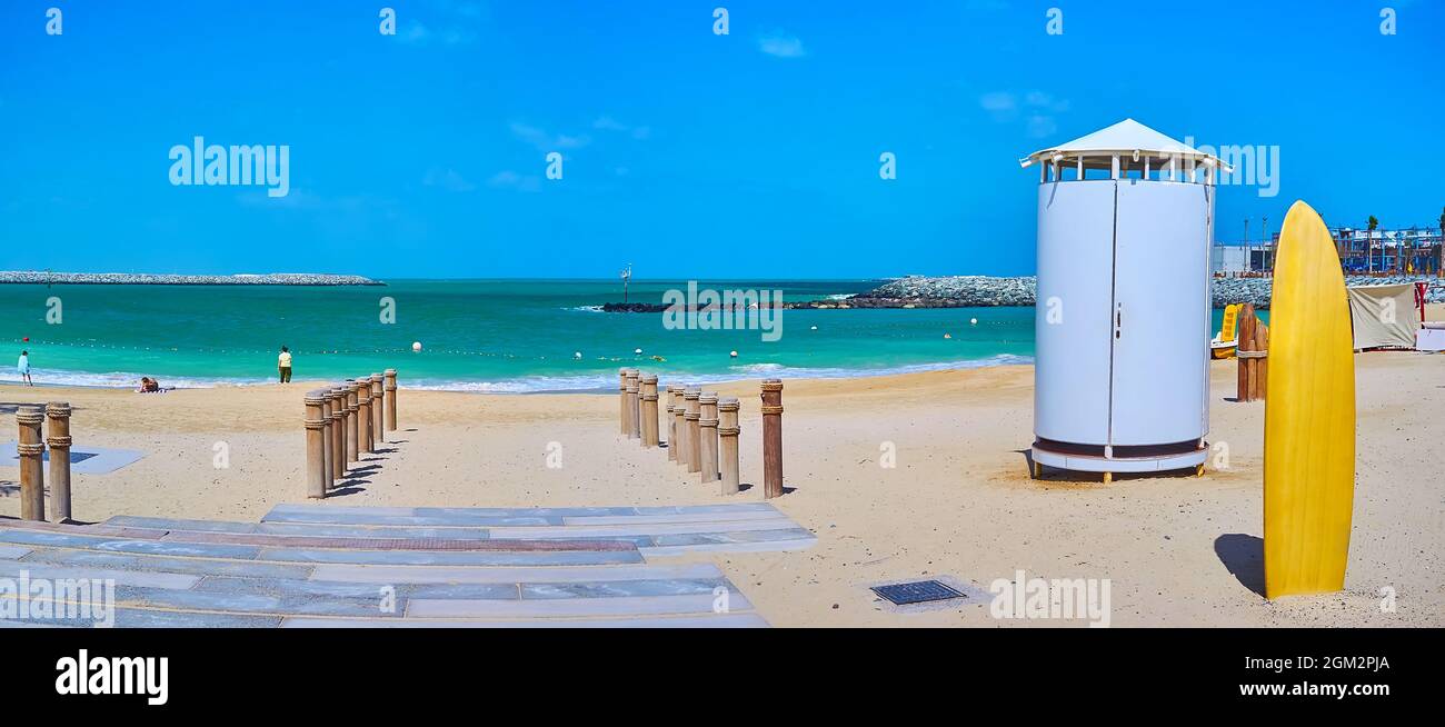 Panorama of the white sand La Mer public beach with a view of the ...