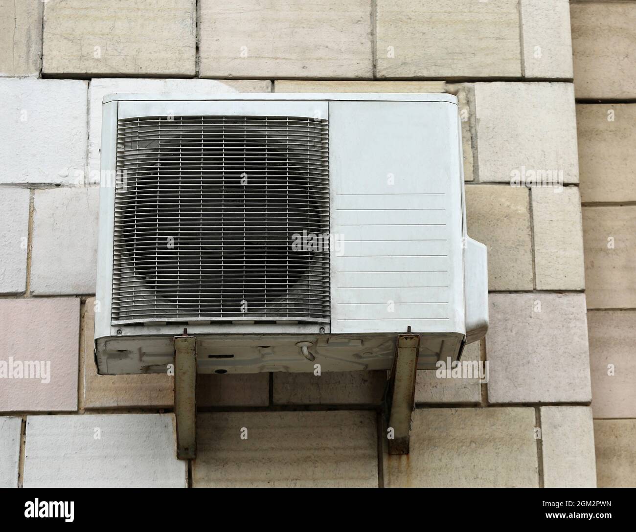 Air conditioner on wall of building, outdoors Stock Photo - Alamy
