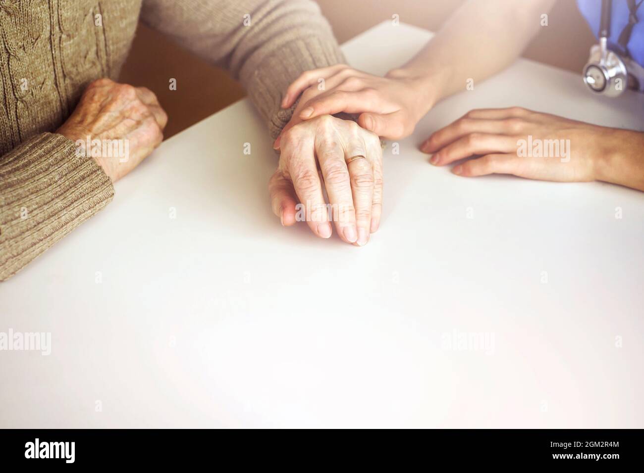 Handshake, caring, trust, treatment and support Stock Photo - Alamy