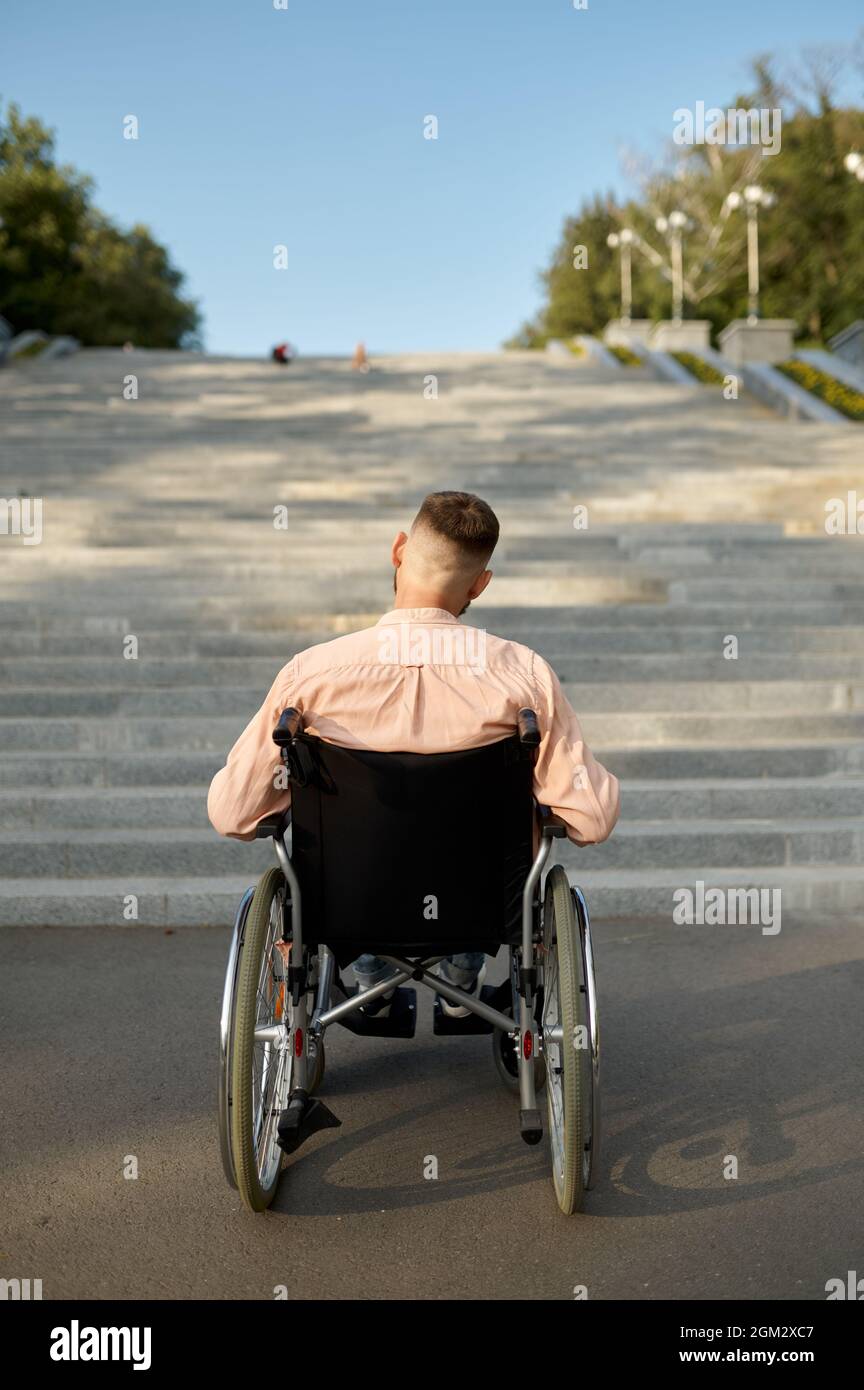 Person In Wheelchair From Behind