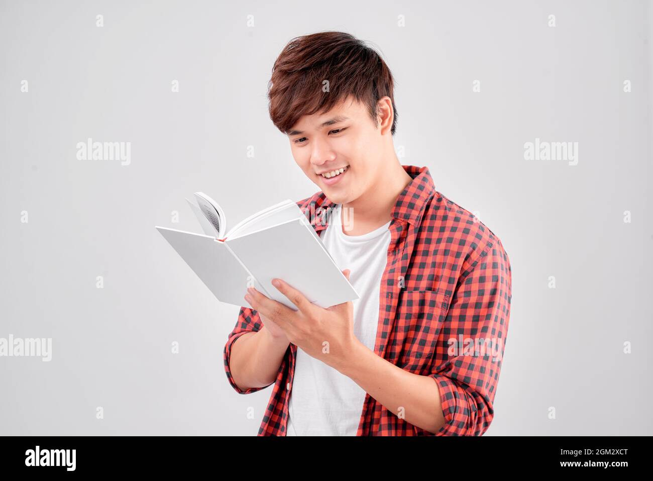 Portrait Of Smart Intelligent asian Student Reading Book Stock Photo ...