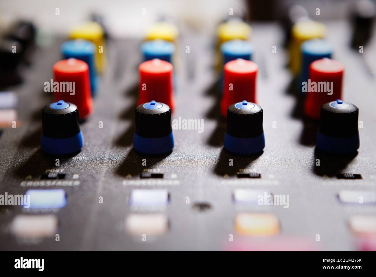 Sound frequency regulators on professional dj sound mixer device. Disc ...