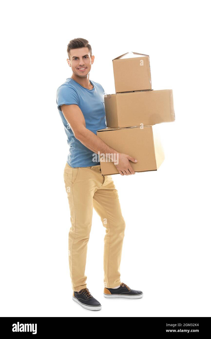 Man with moving boxes on white background Stock Photo - Alamy
