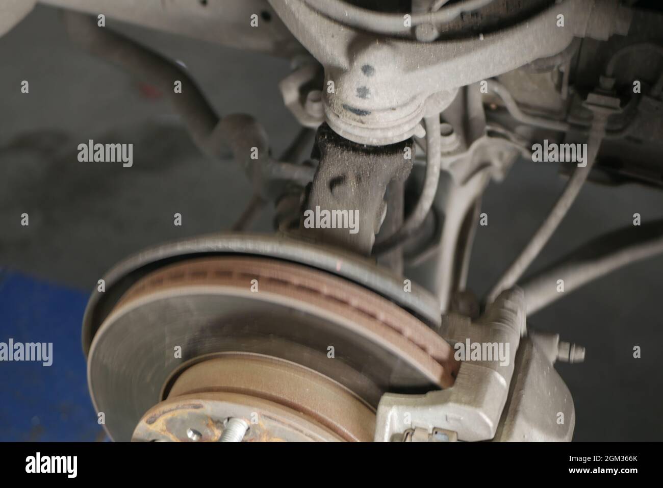 High angle shot of the dissembled vehicle wheel details with brake disk ...