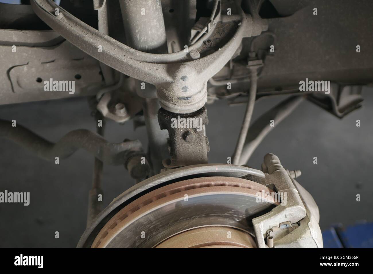 High angle shot of the dissembled vehicle wheel details with brake disk ...
