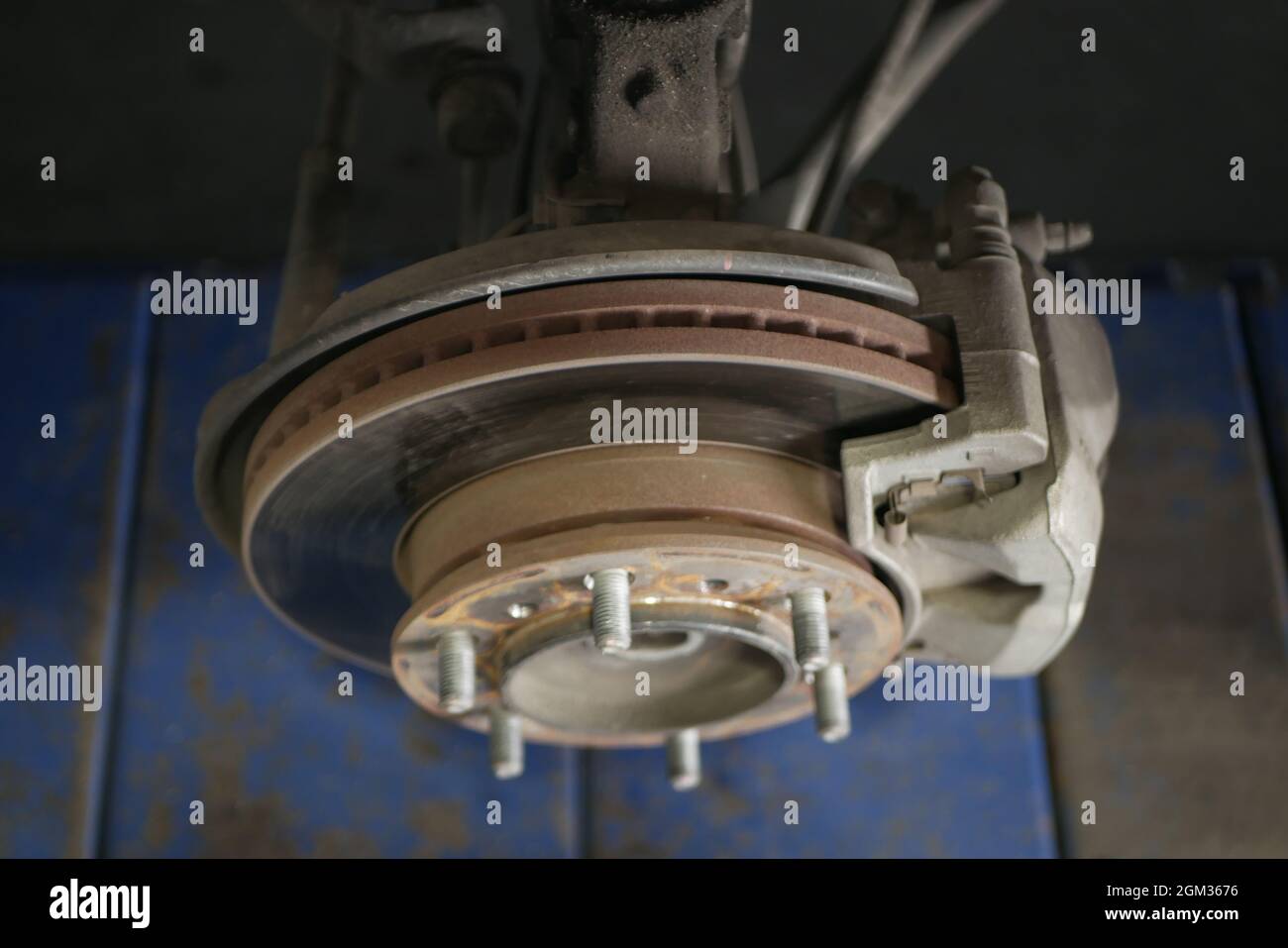 High angle shot of the dissembled vehicle wheel details with brake disk ...