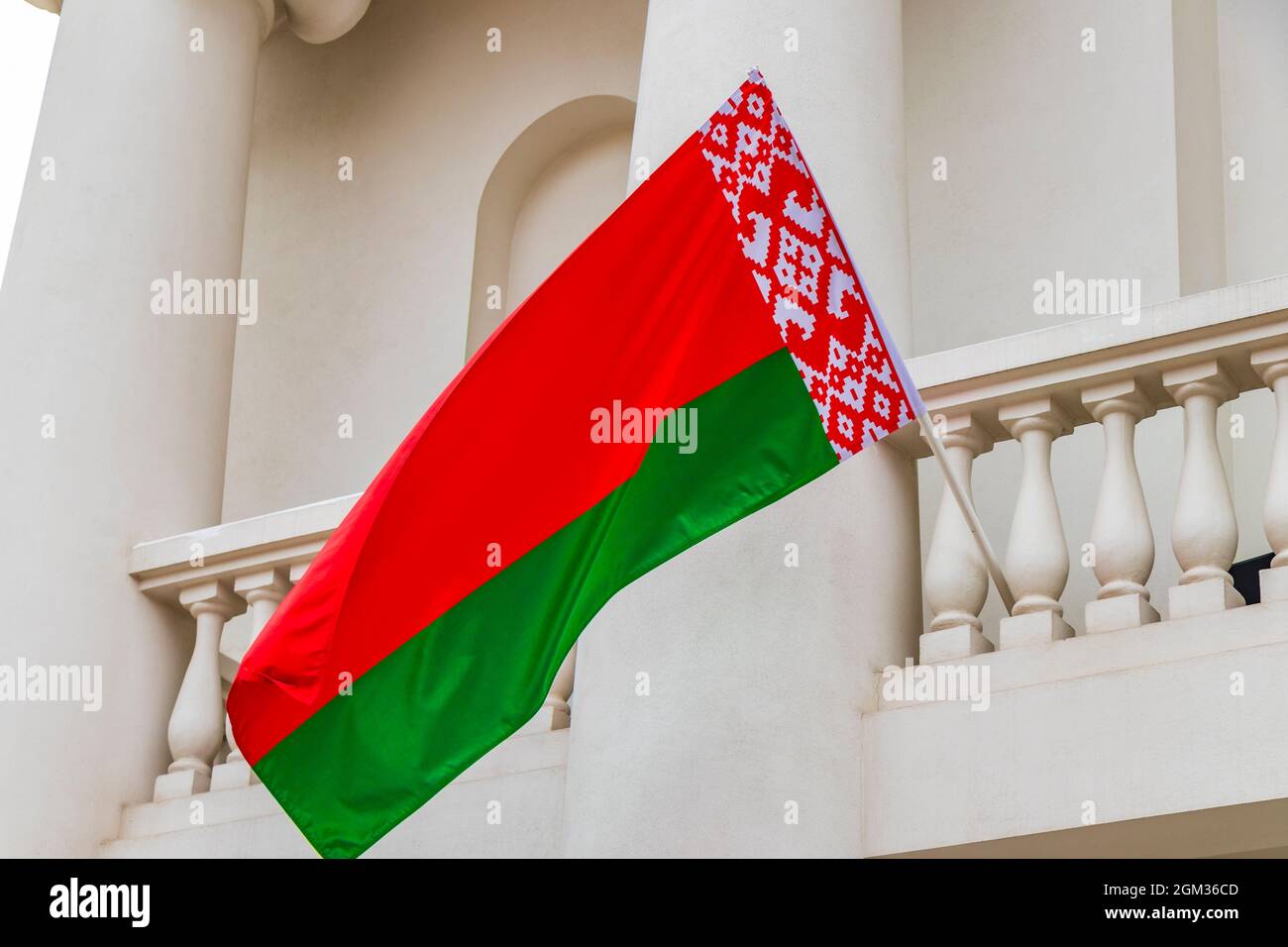 Flag of Belarus on a building with white background belarusian flag red ...