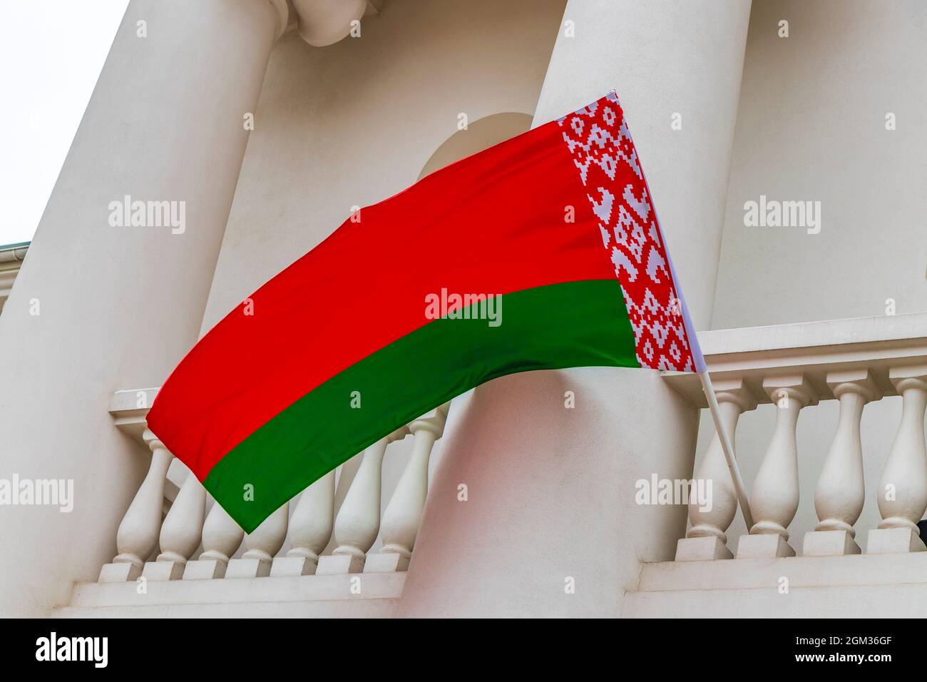 Flag of Belarus on a building with white background belarusian flag red ...