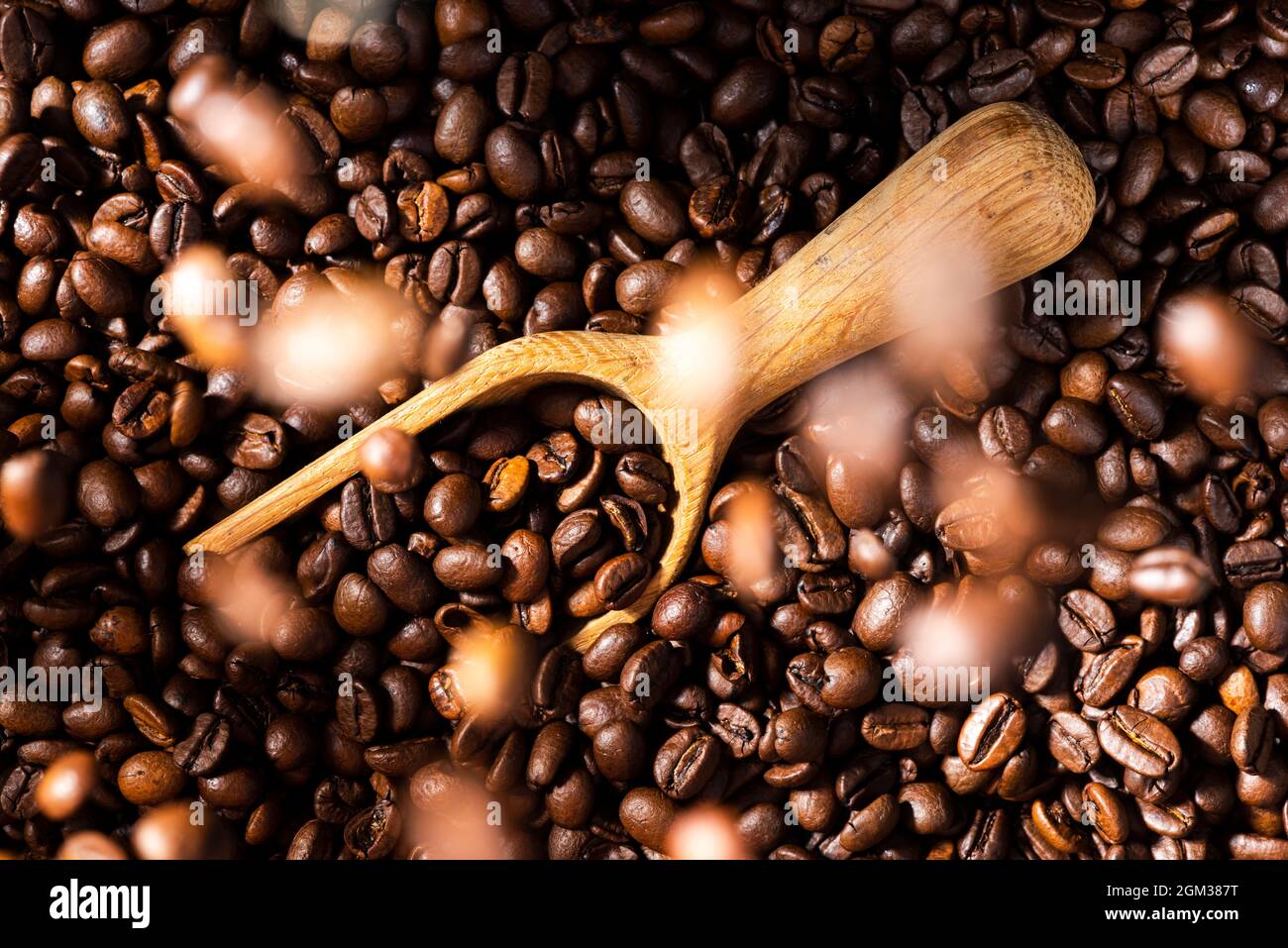 Roasted Coffee Beans Background Texture, Wooden Spoon and Flying Beans ...