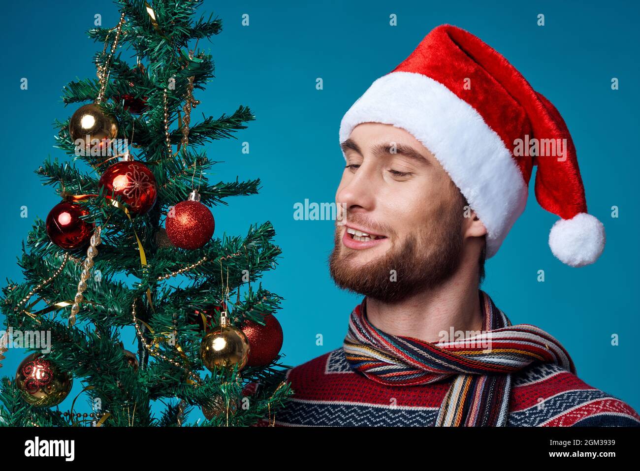 handsome man in a santa hat Christmas decorations holiday New Year ...