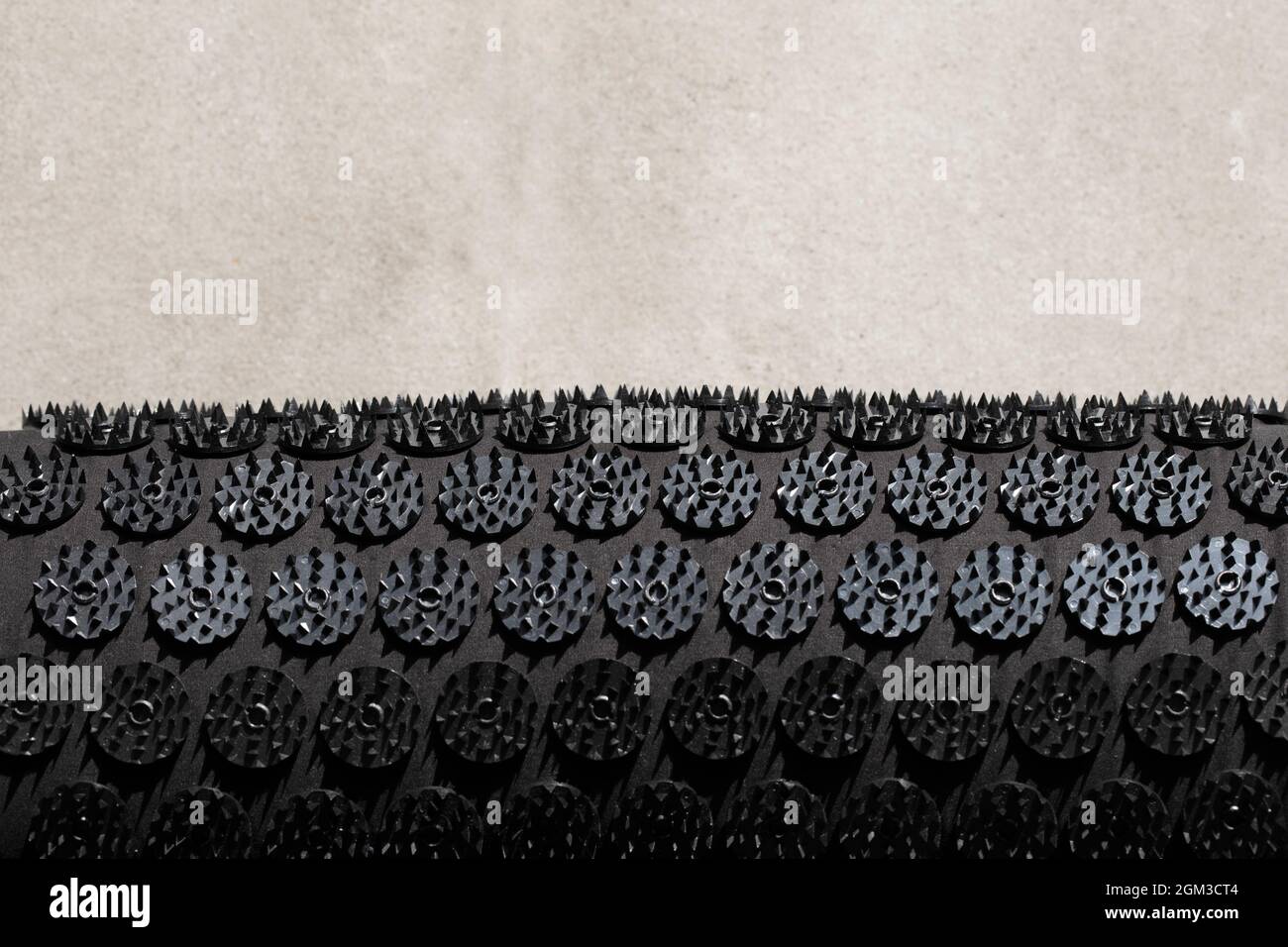 Acupuncture mat with many plastic spikes. Alternative therapy and ...