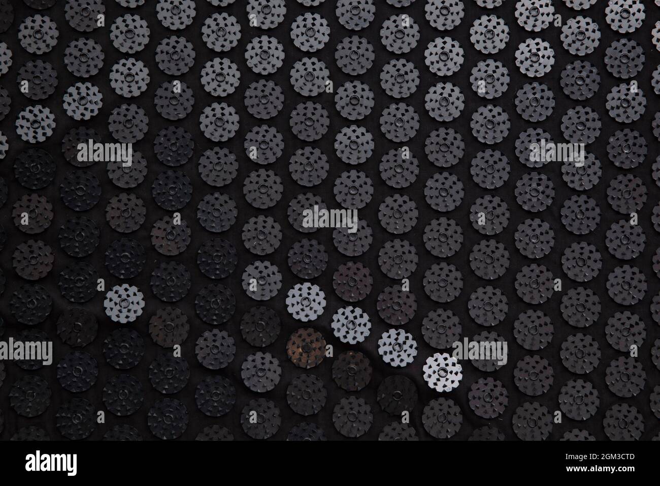Acupuncture mat with many plastic spikes. Alternative therapy and ...