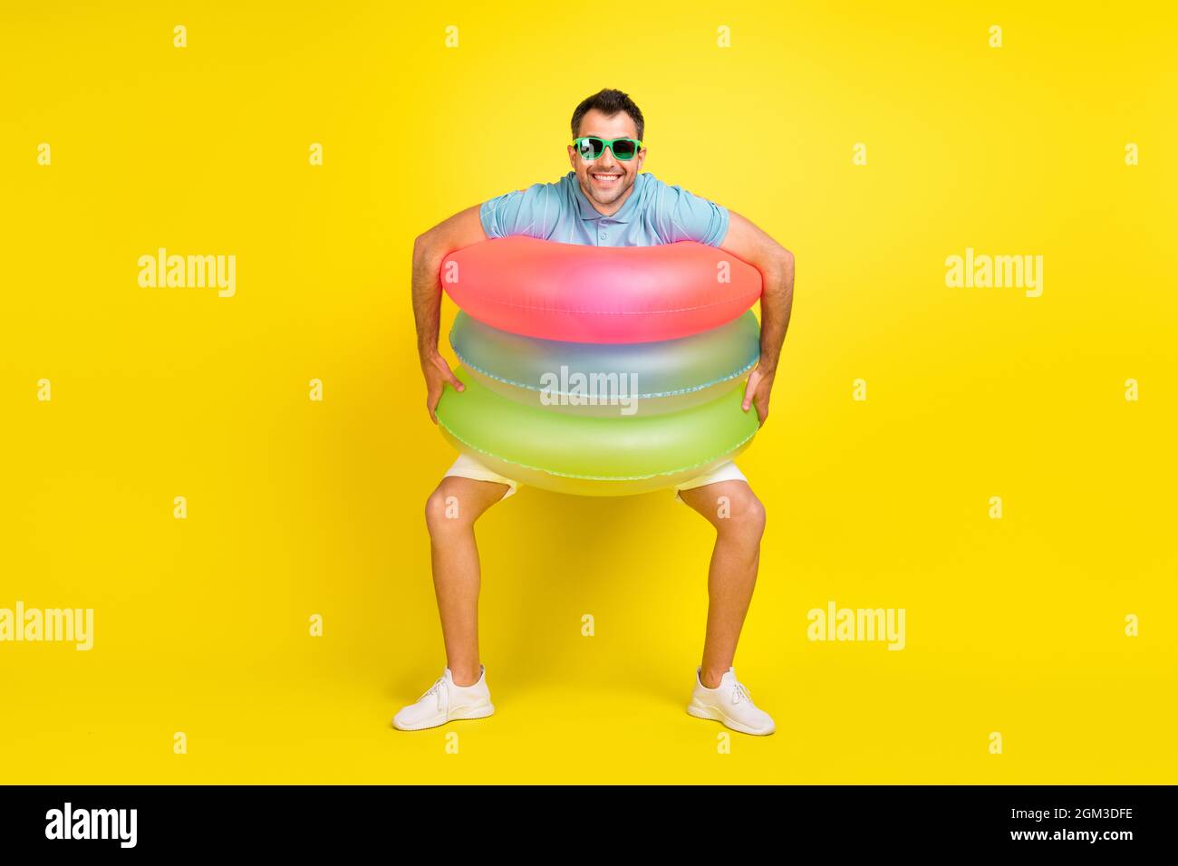 Photo of pretty funky guy dressed blue t-shirt dark eyewear smiling ...