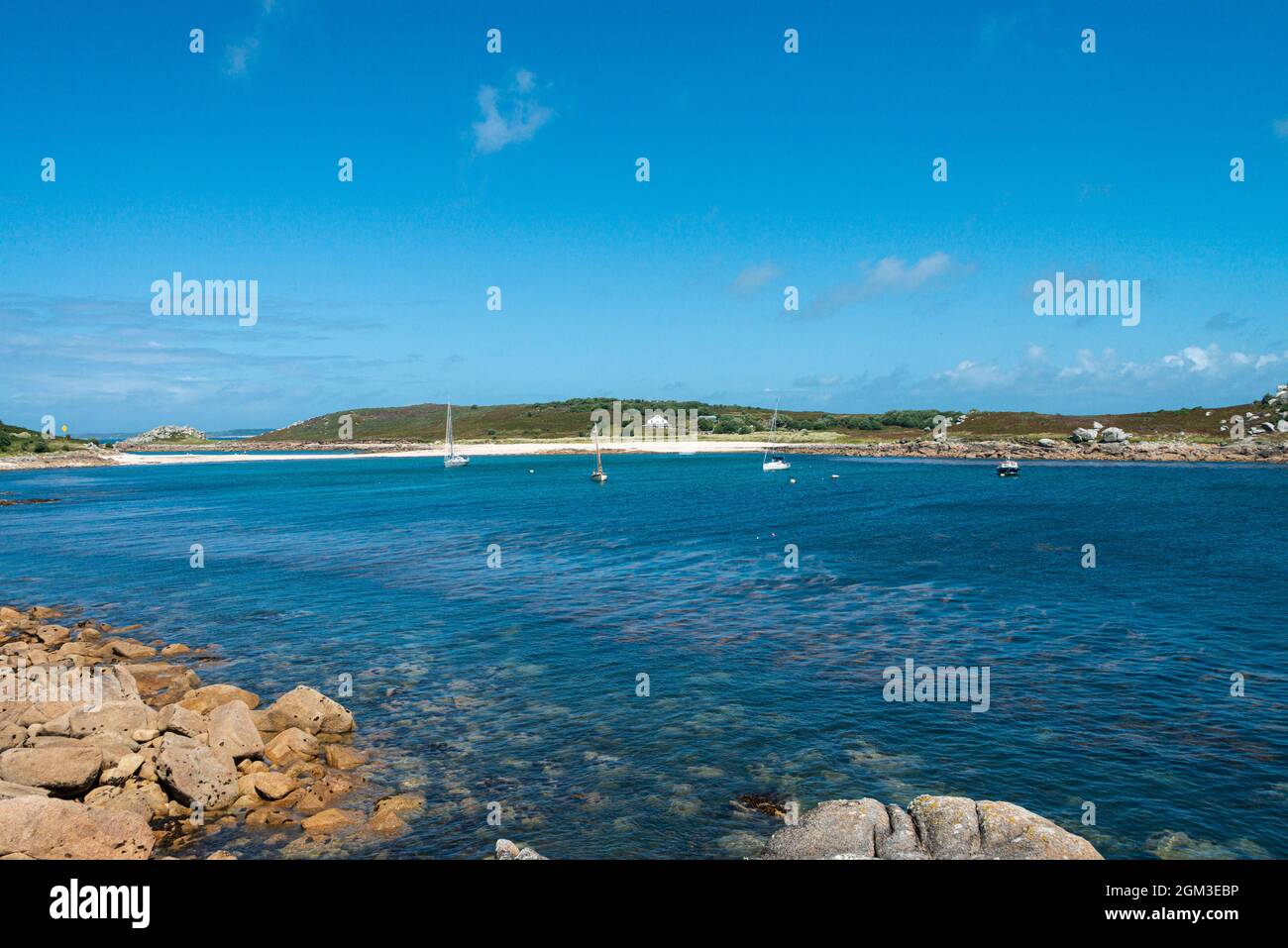 Boats in The Cove between Gugh and St Agnes, Isles of Scilly Stock ...