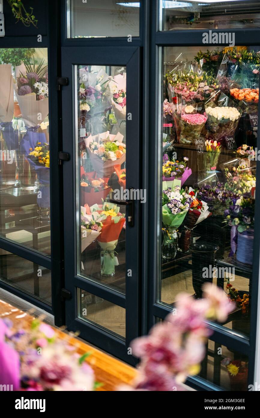 flowers shop refrigerator. Flowers for sale in a special cold room ...