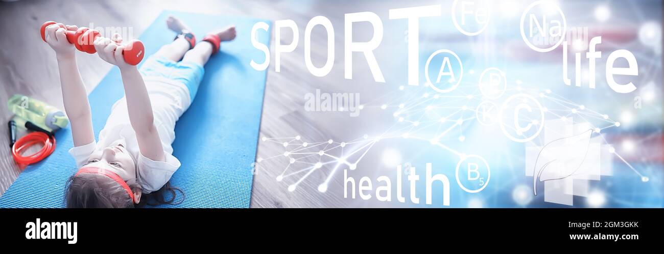 Sport and healthy lifestyle.Child playing sports at home. Yoga mat ...