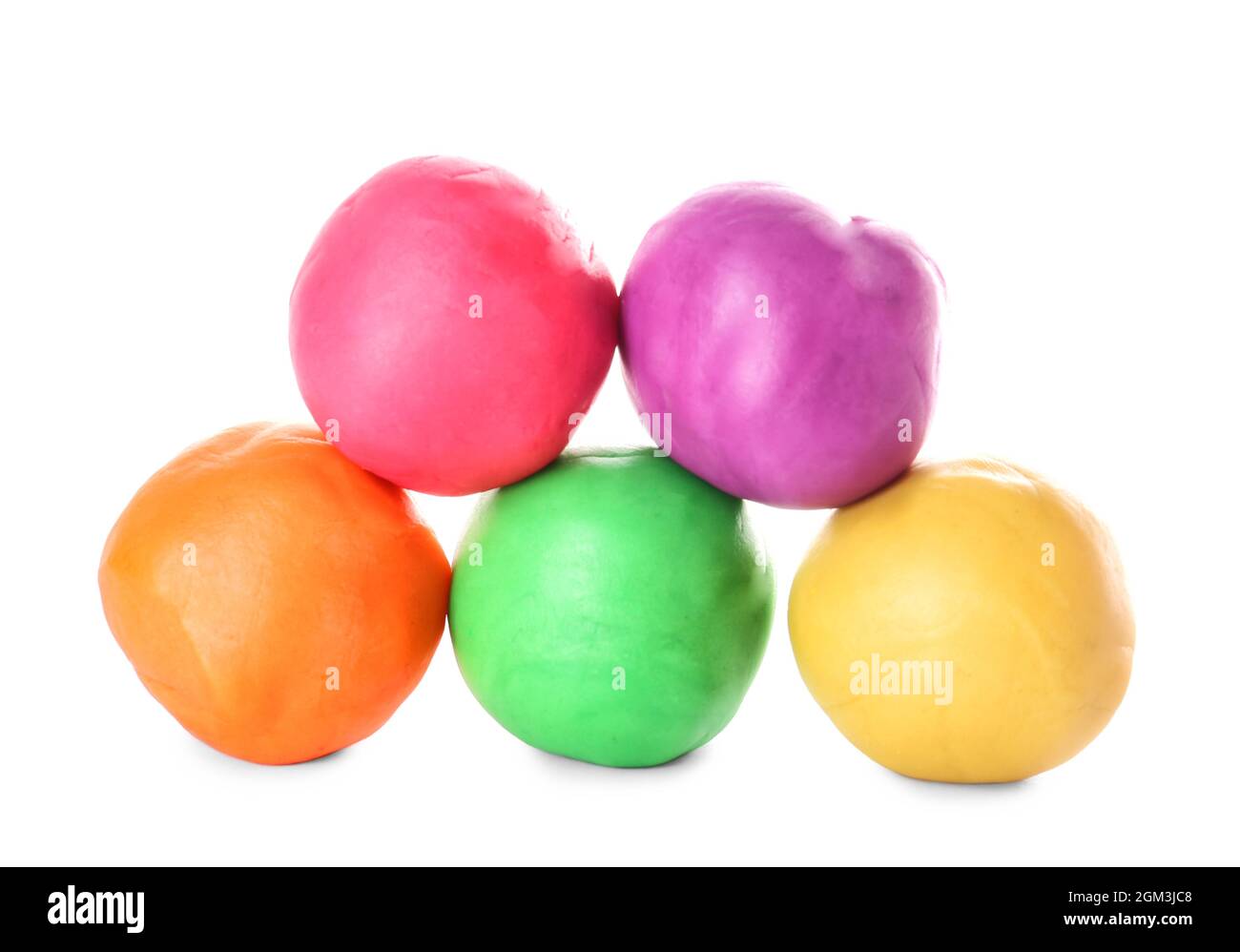Plasticine balls on white background Stock Photo - Alamy