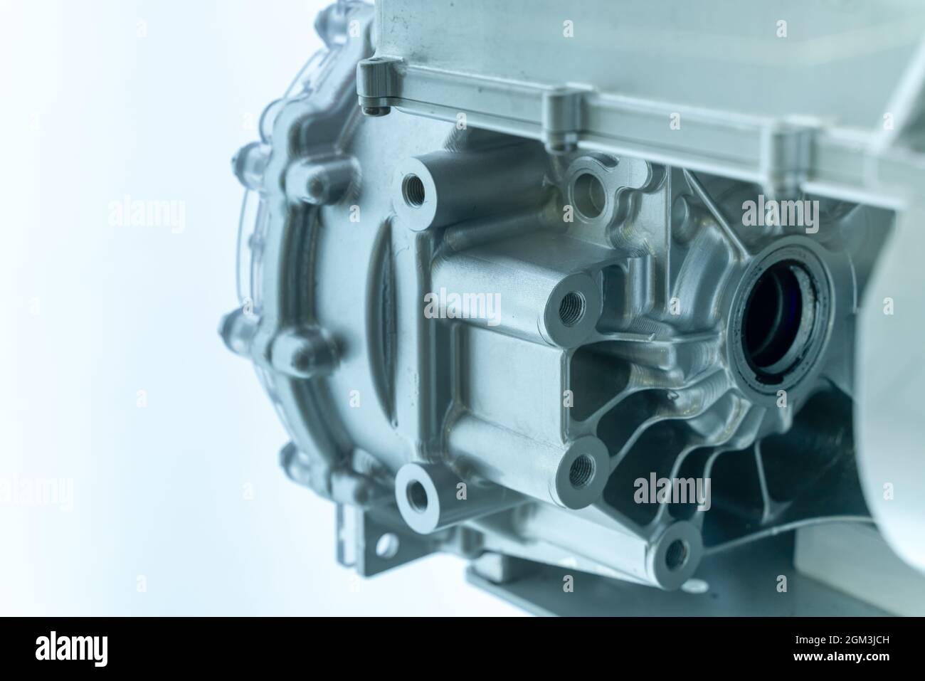 Closeup shot of a modern electric car engine isolated on a white ...