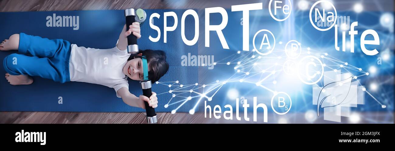 Sport and healthy lifestyle.Child playing sports at home. Yoga mat ...