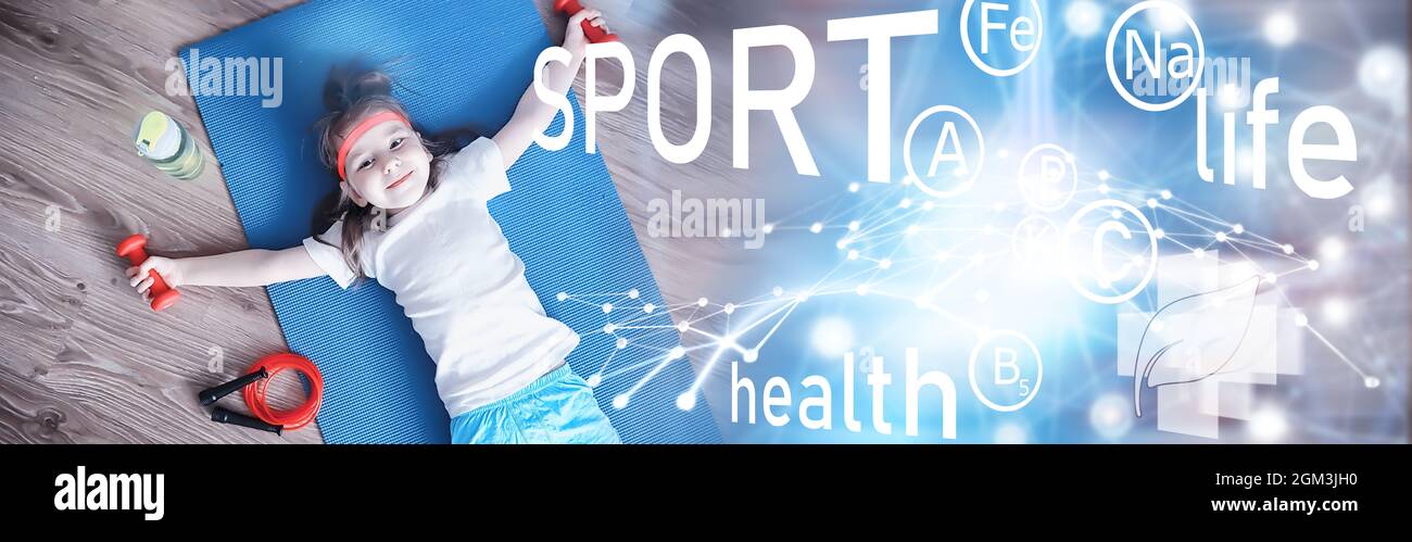 Sport and healthy lifestyle.Child playing sports at home. Yoga mat ...