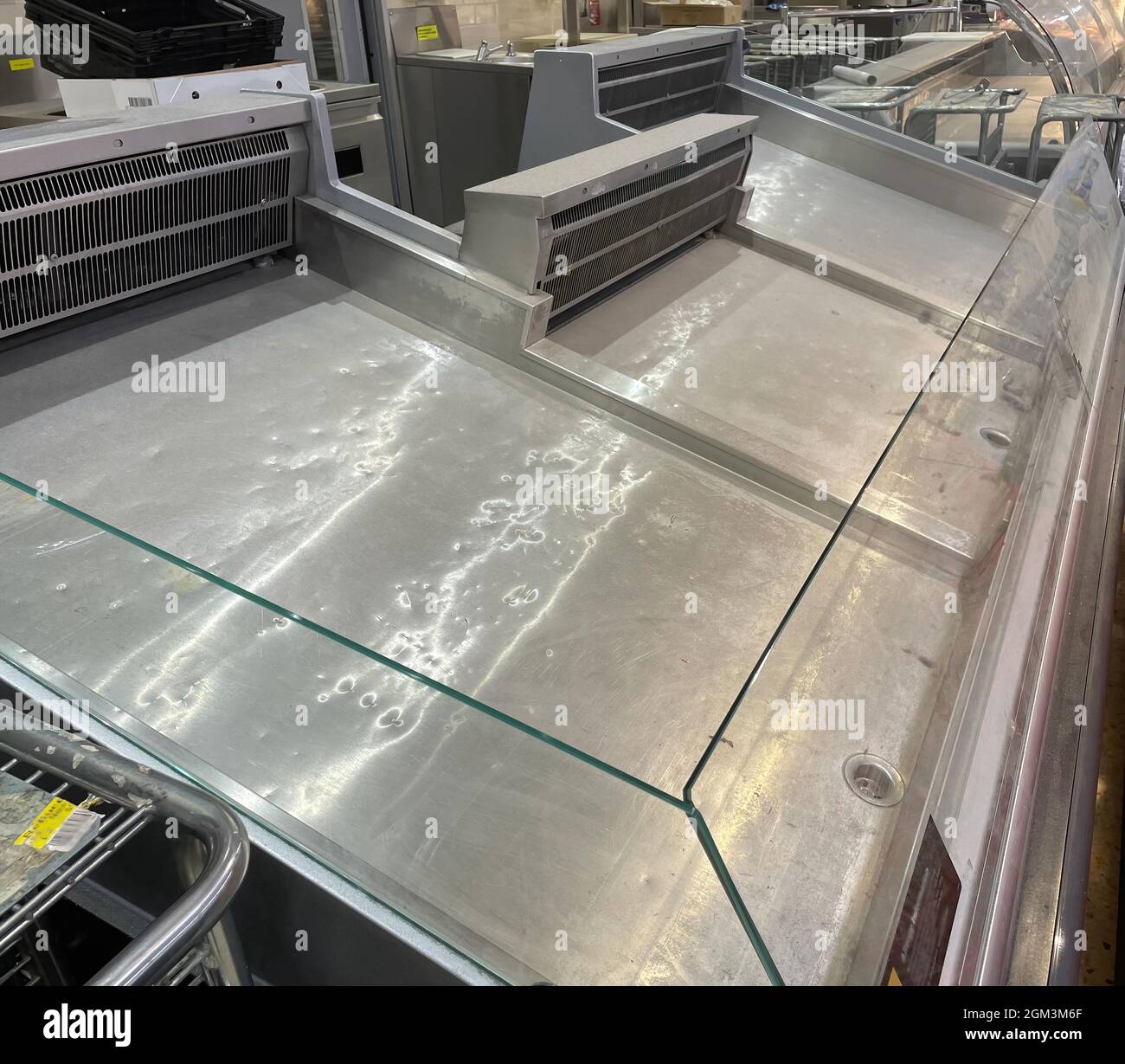 Empty frozen food counter at a supermarket.Shortage of food.No ...