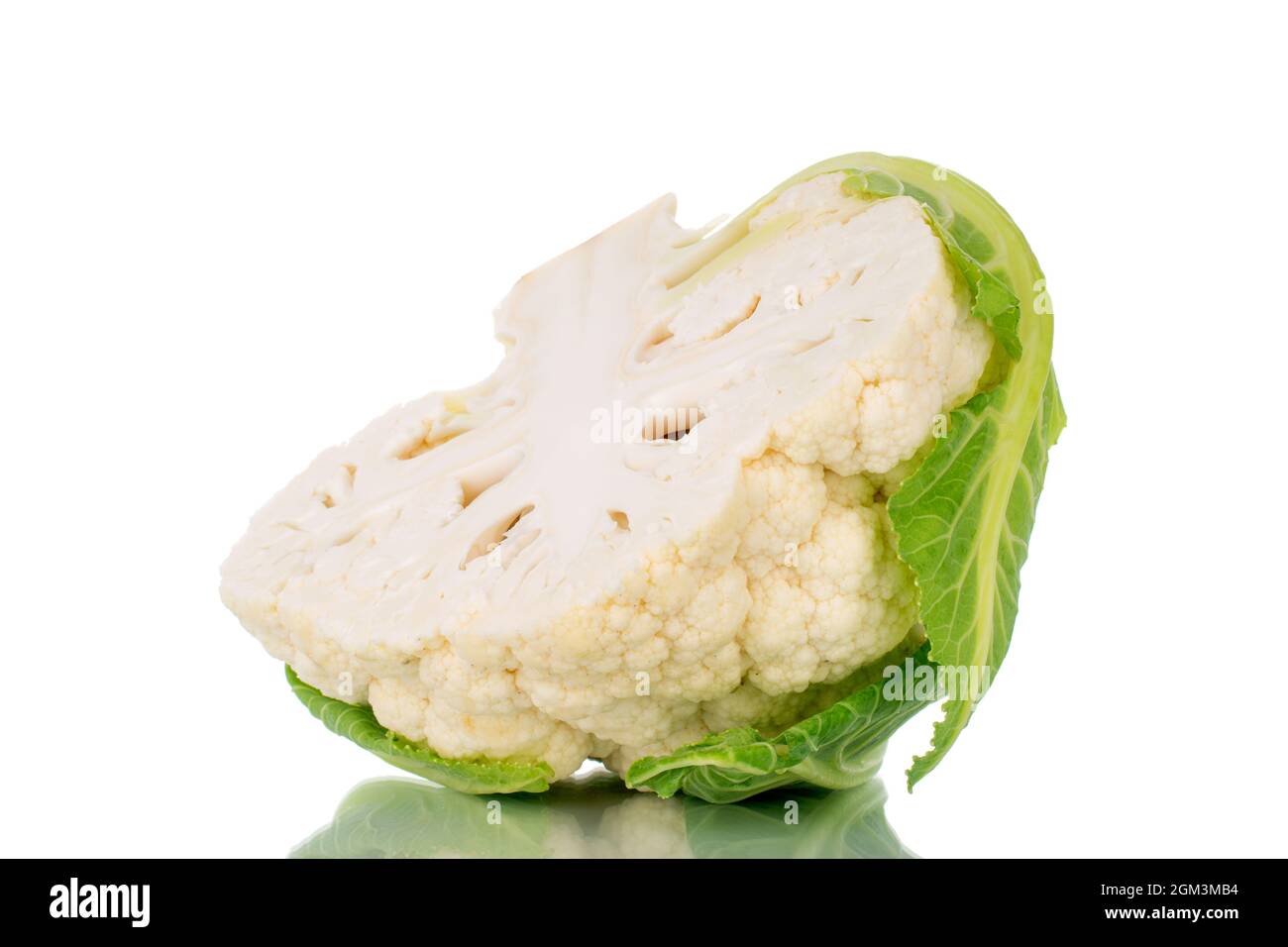 One half of fragrant organic cauliflower, close-up, isolated on white ...