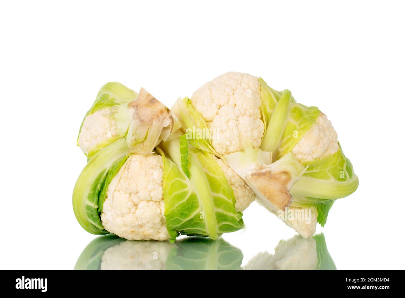 Two halves of fragrant organic cauliflower, close-up, isolated on white ...