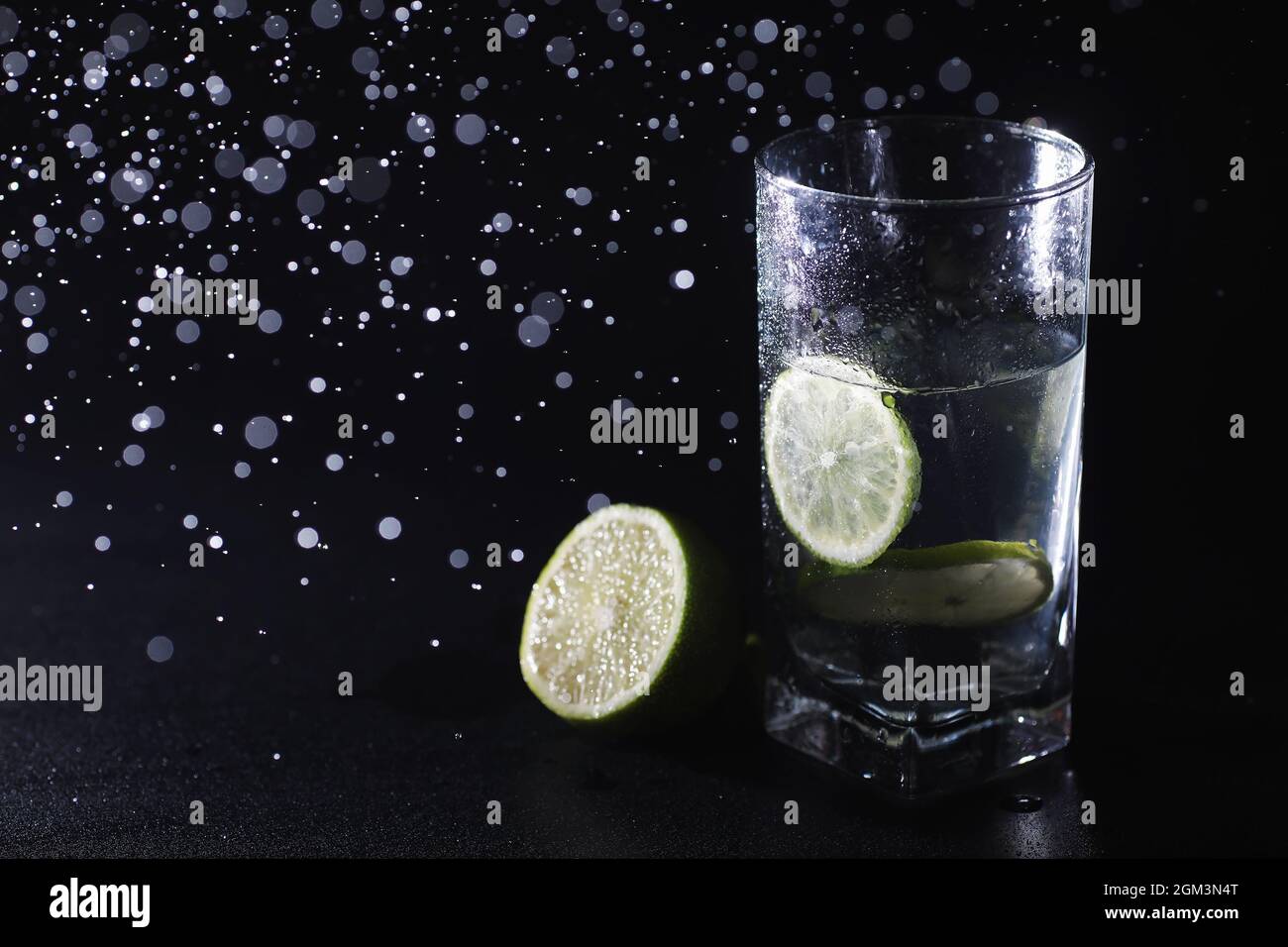 Lime water. Drinking water with fresh lime. Mineral water. Healthy ...