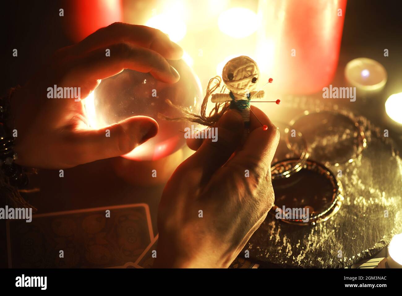 Mystic still life with voodoo doll, the tarot cards, books, evil ...