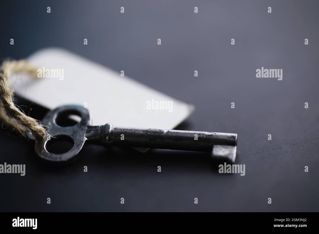 Set of vintage keys for lock. Retro keys on a dark stone background ...