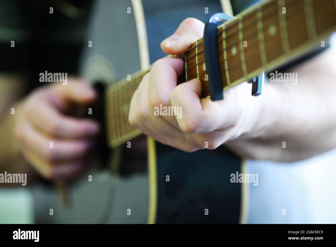 An acoustic guitar for artist playing a stringed musical instrument on ...