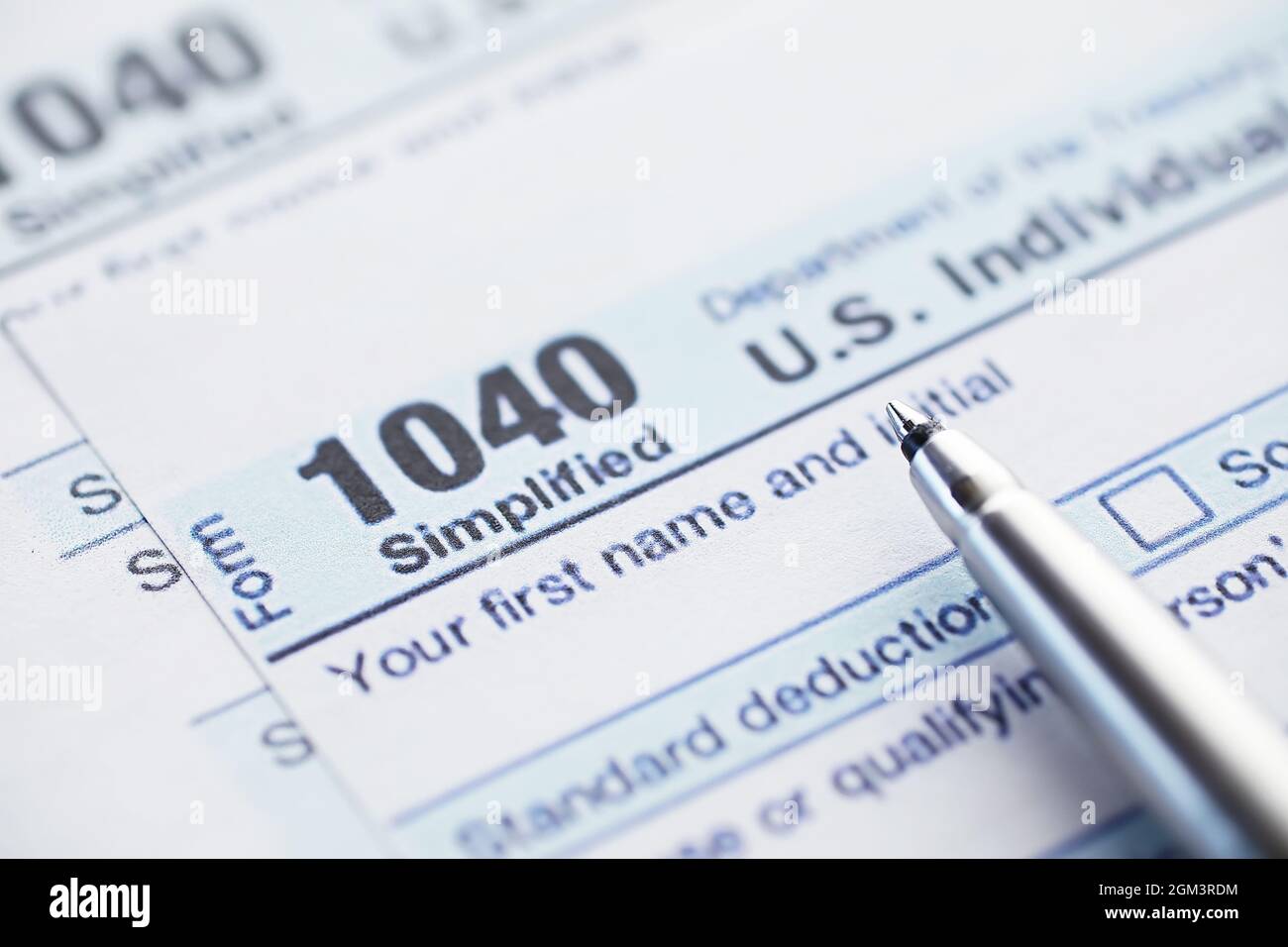 Annual tax reporting. Tax form on the table. Financial statements ...