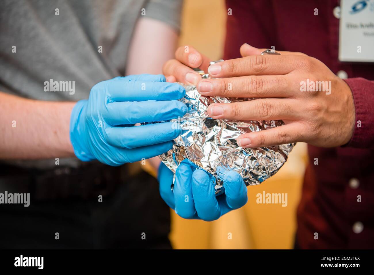 Latex gloved hand science experiment school children Stock Photo - Alamy