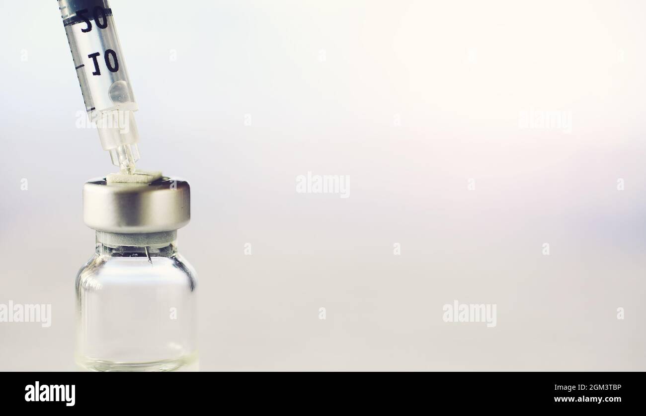 A man signs a medical document. Medical equipment on the table ...