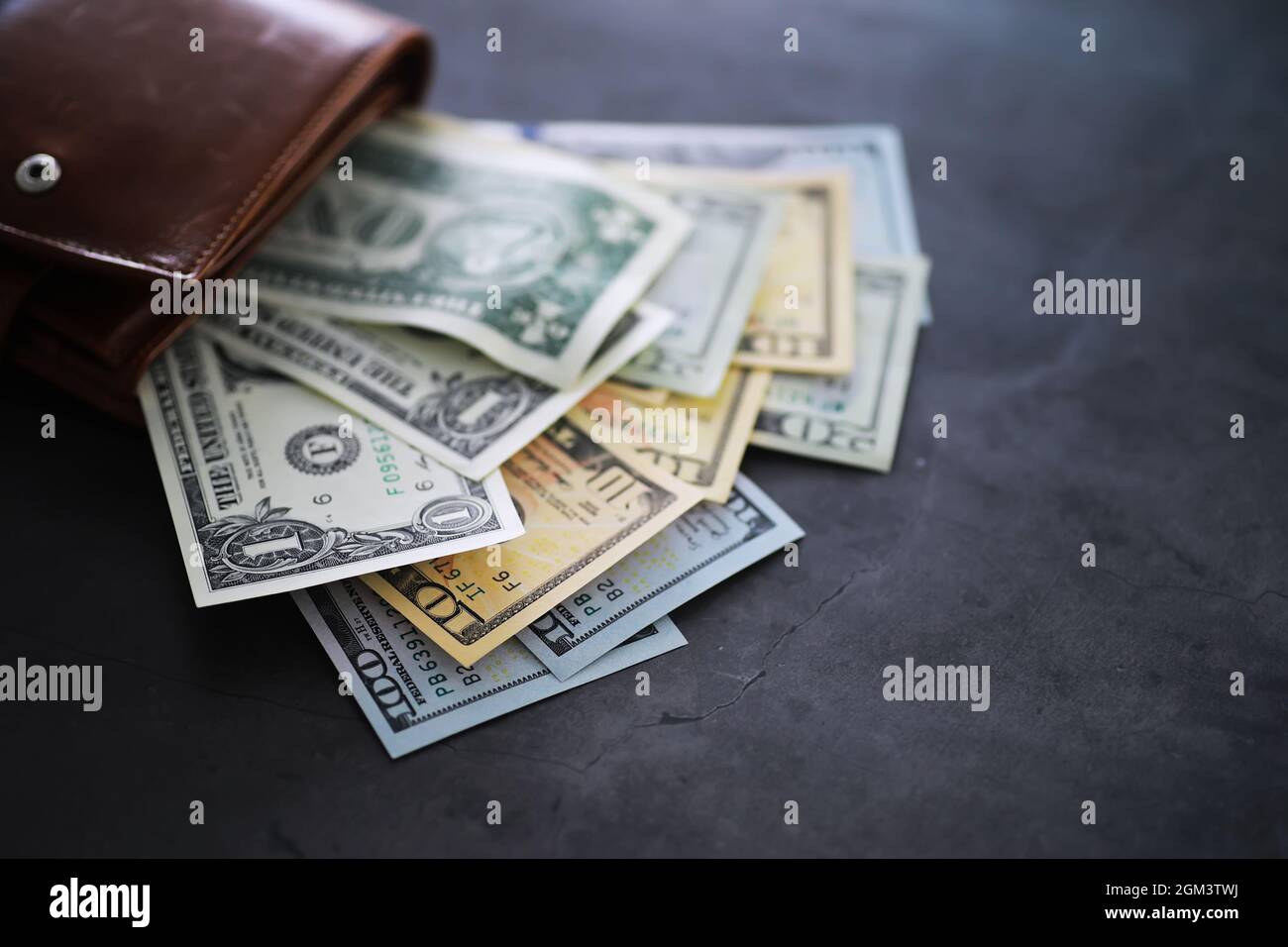 Cash money in a large pile as a finance background. Paper money close ...