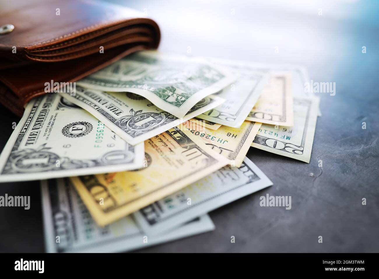 Cash money in a large pile as a finance background. Paper money close ...