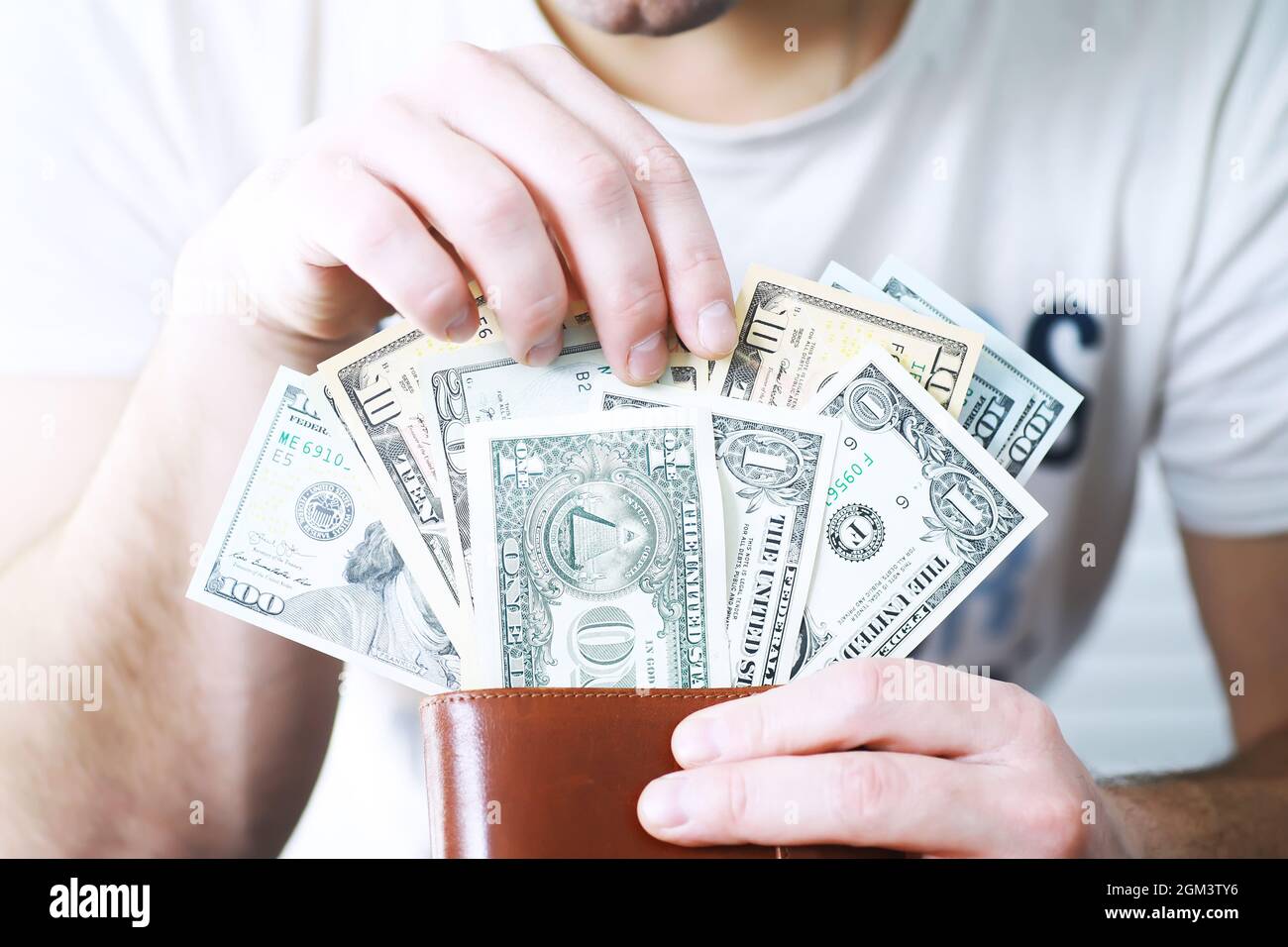 Cash money in a large pile as a finance background. Paper money close ...