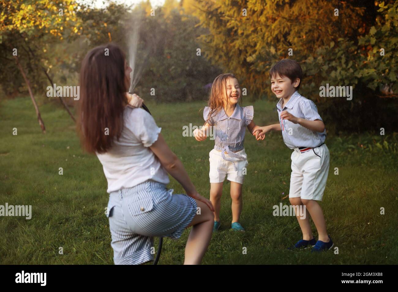 Children on a walk in the summer. Children indulge in country. Laughter ...