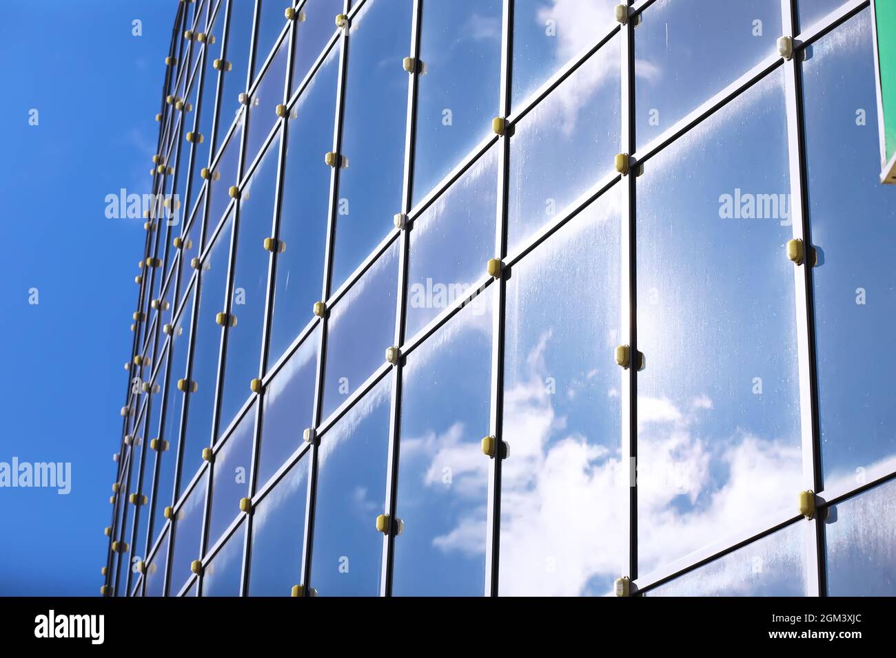 Architectural detail of the facade with multiple reflections of other ...