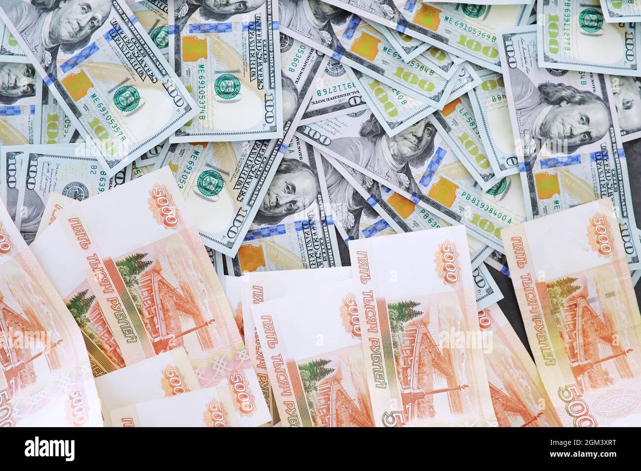 Cash money in a large pile as a finance background. Paper money close ...