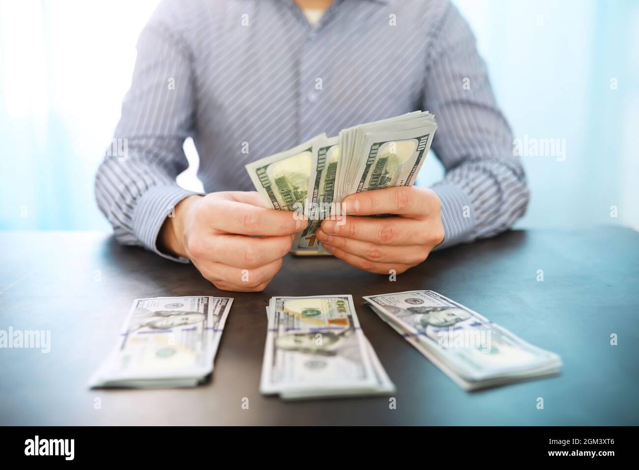Cash money in a large pile as a finance background. Paper money close ...