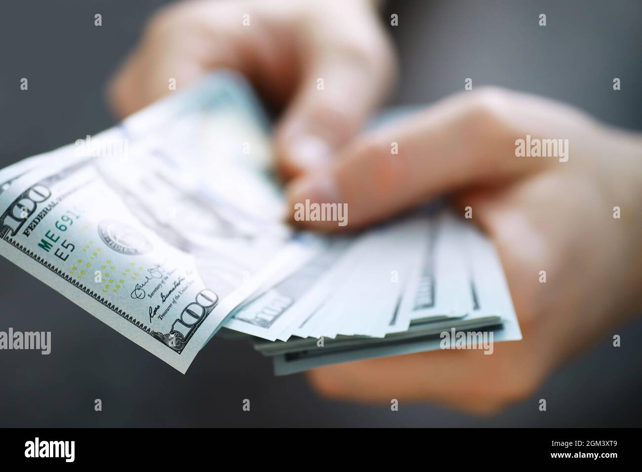 Cash money in a large pile as a finance background. Paper money close ...