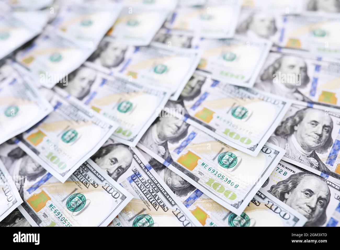 Cash money in a large pile as a finance background. Paper money close ...