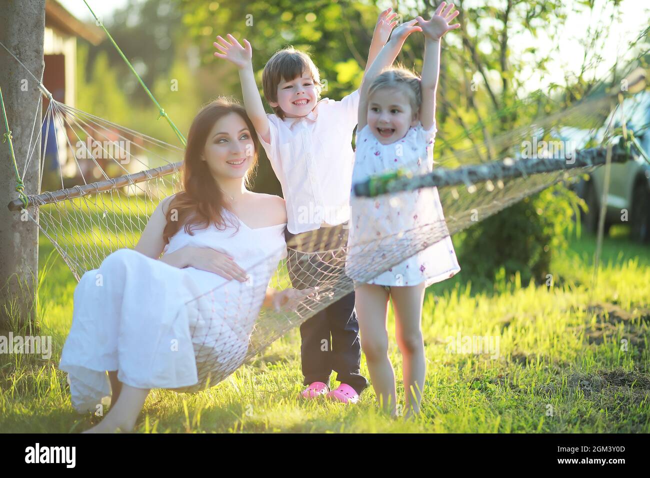 The family is resting in nature. Vacations in the fresh air. Weekend ...