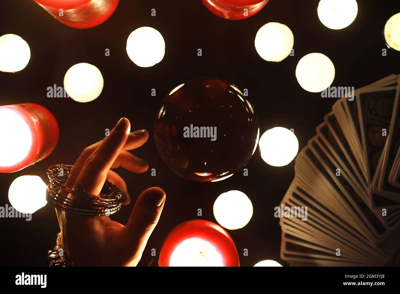 Mystic still life with voodoo doll, the tarot cards, books, evil ...