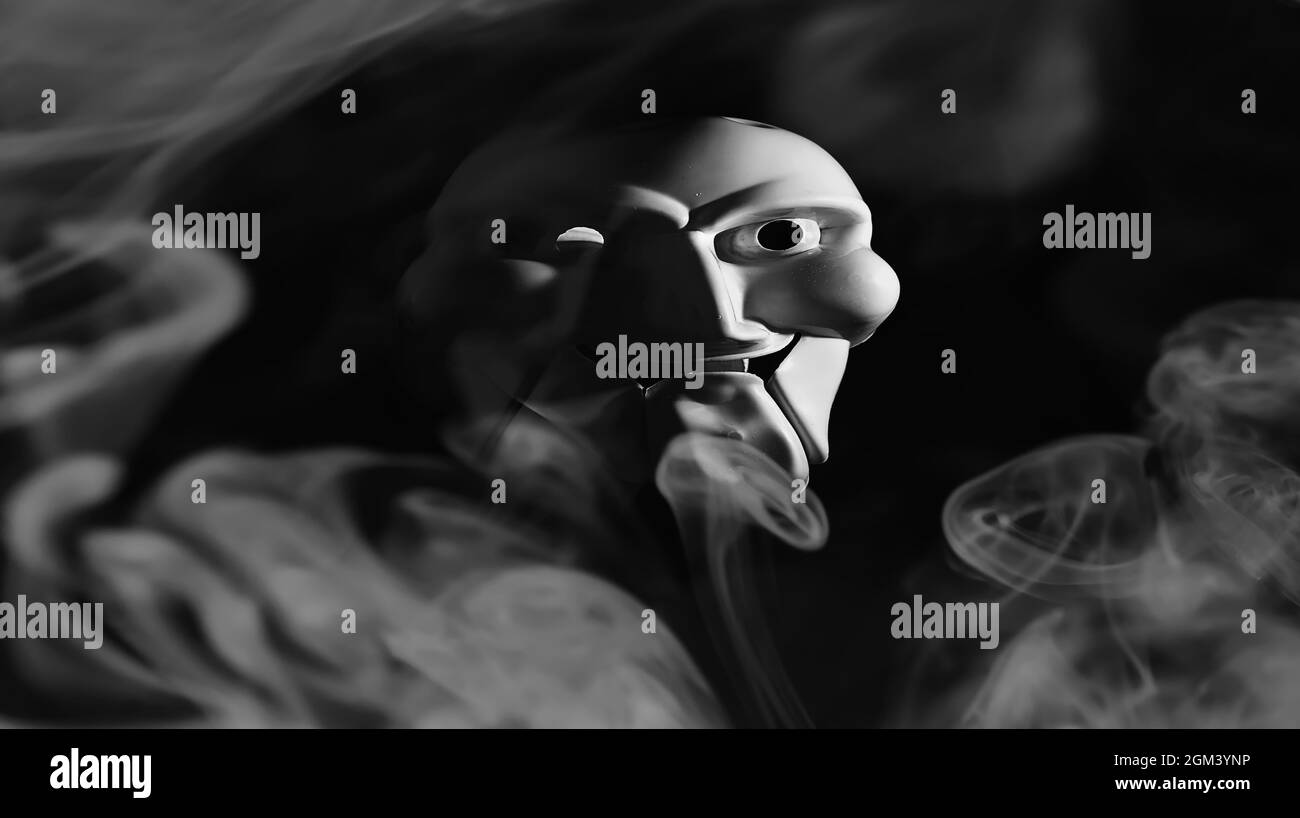 White scary mask on a black background with whites hands Stock Photo ...