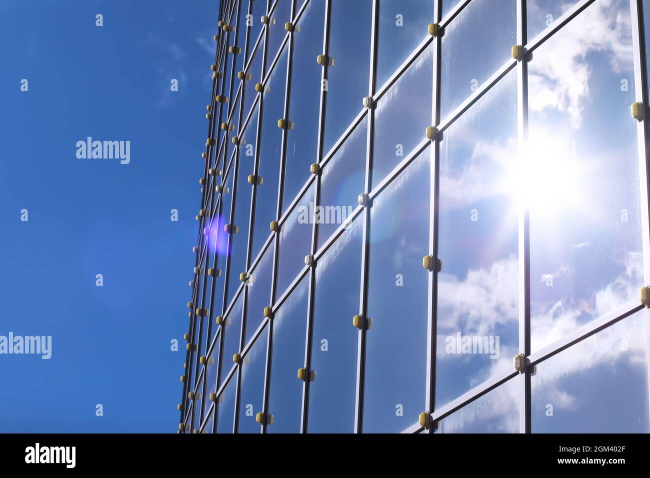 Architectural detail of the facade with multiple reflections of other ...