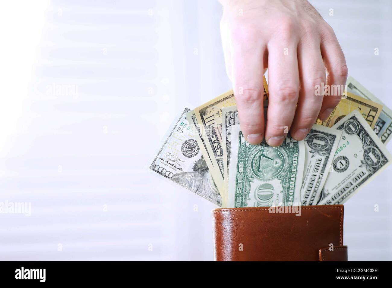 Cash money in a large pile as a finance background. Paper money close ...