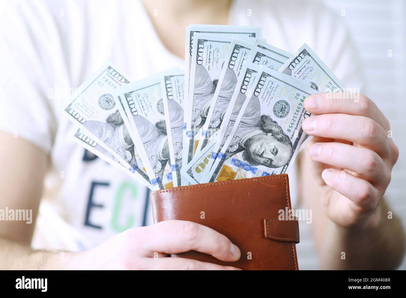 Cash money in a large pile as a finance background. Paper money close ...