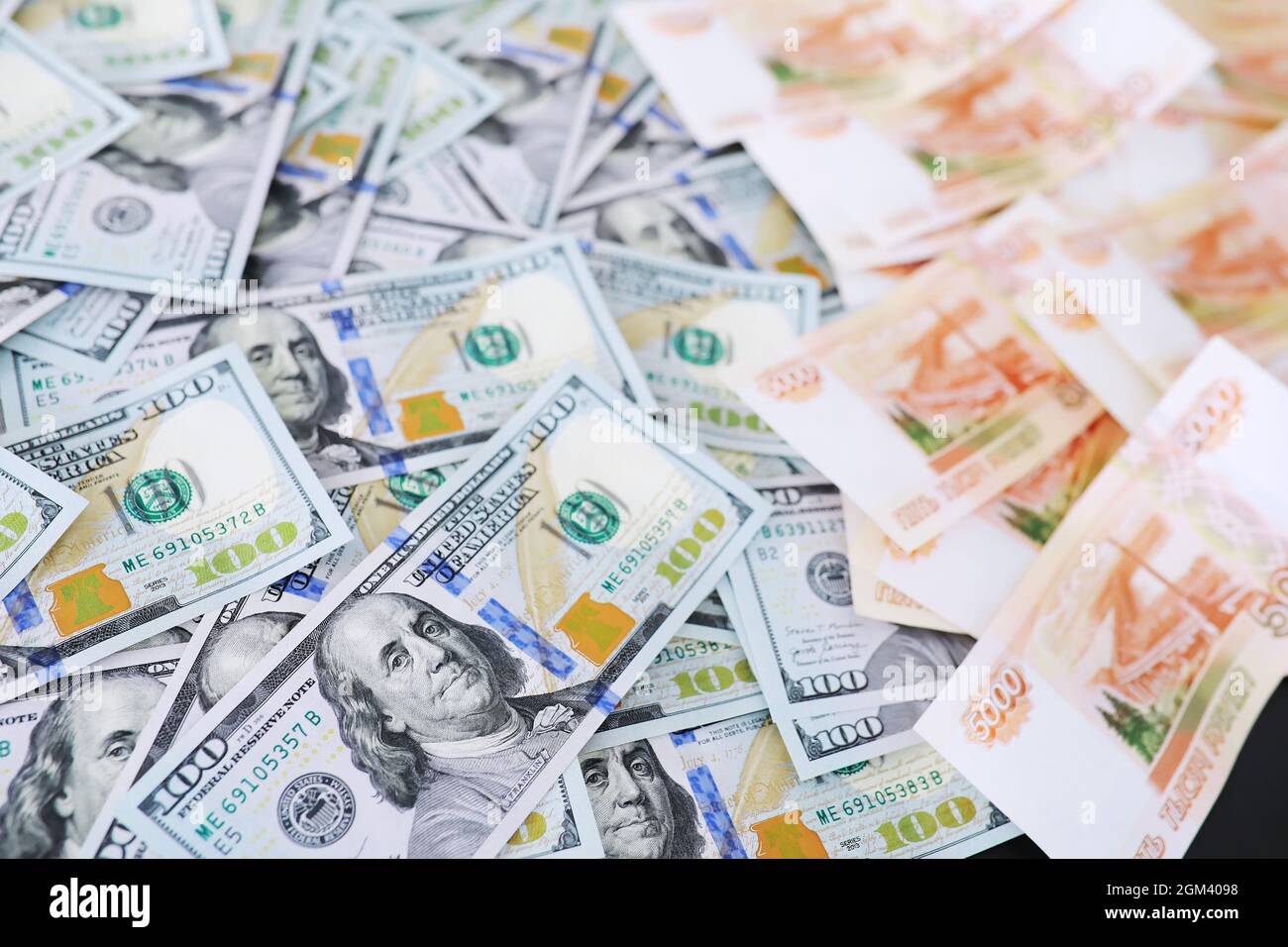 Cash money in a large pile as a finance background. Paper money close ...